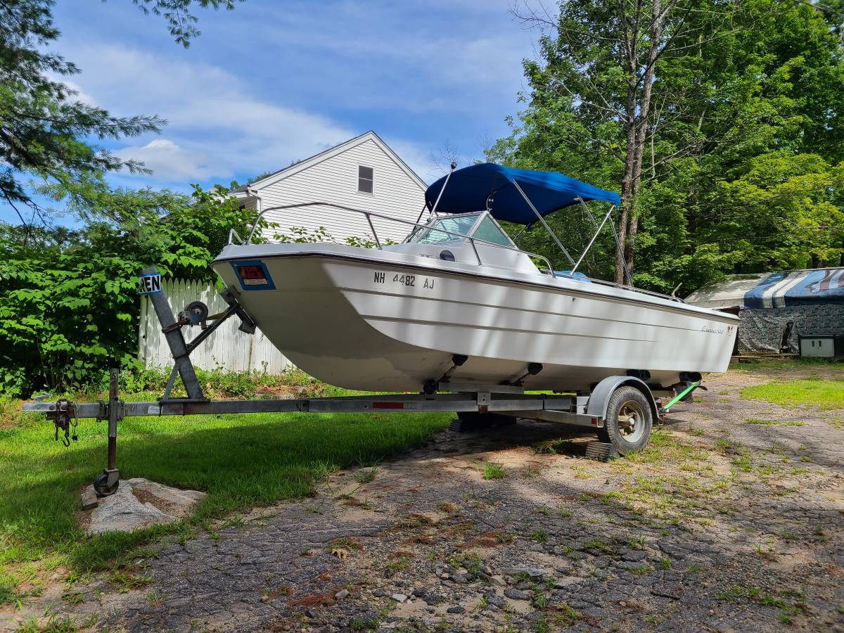 1969 Thunderbird Comanche boat with motor and trailer | Looknet